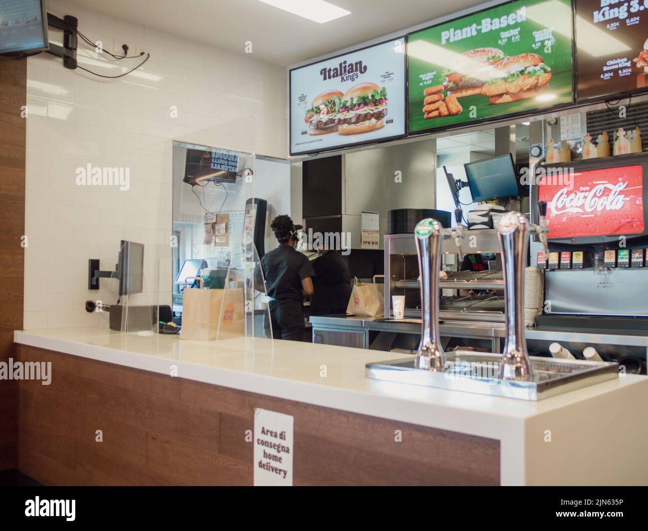 woman orders meal in the electronic touch screen terminal menu in the ...