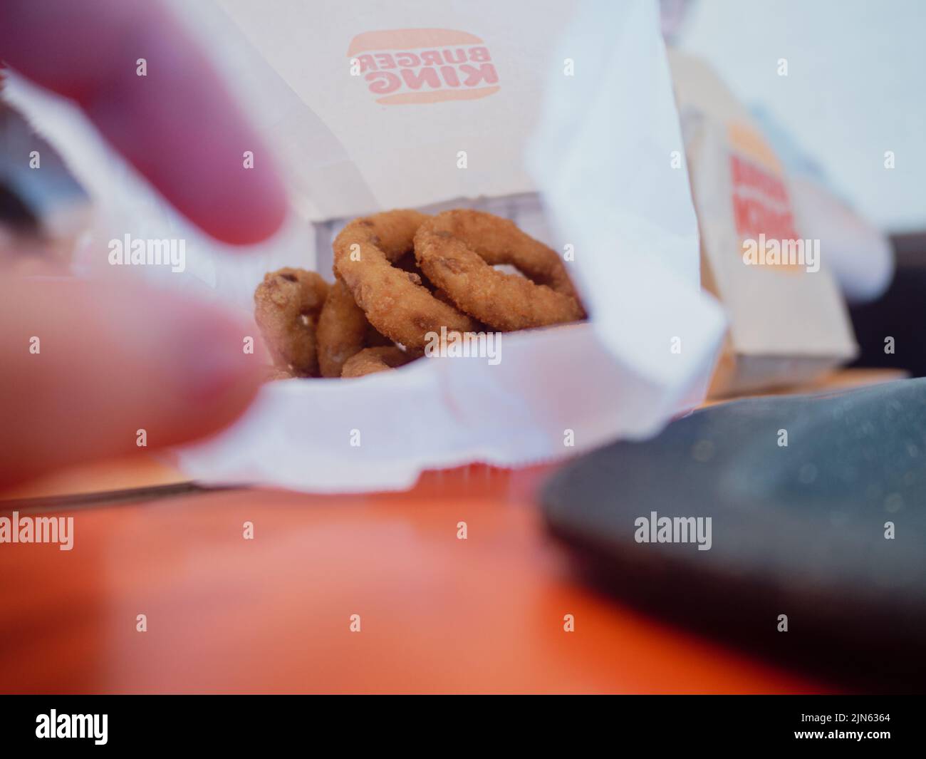 person picking a snack at the fast food store Stock Photo - Alamy