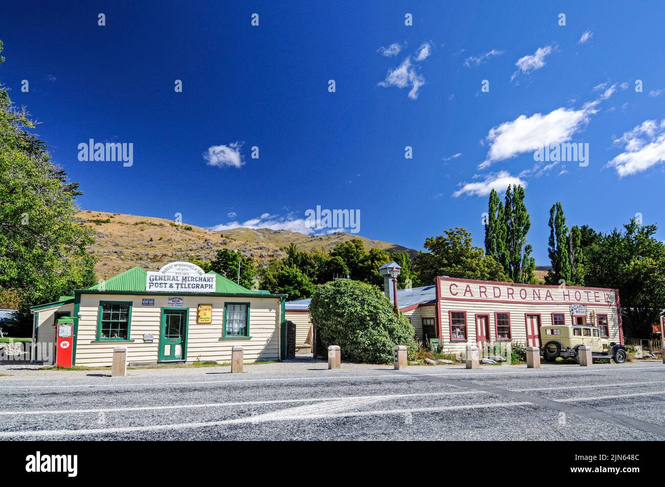 Two wooden buildings of the Gold rush pioneering days in Cardrona is ...