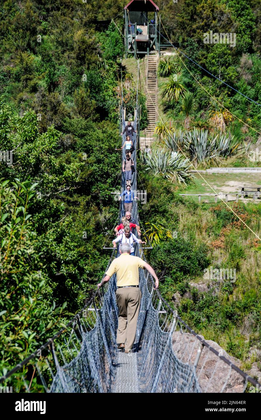 Two-way traffic as visitors cross New Zealand's longest swing bridge ...