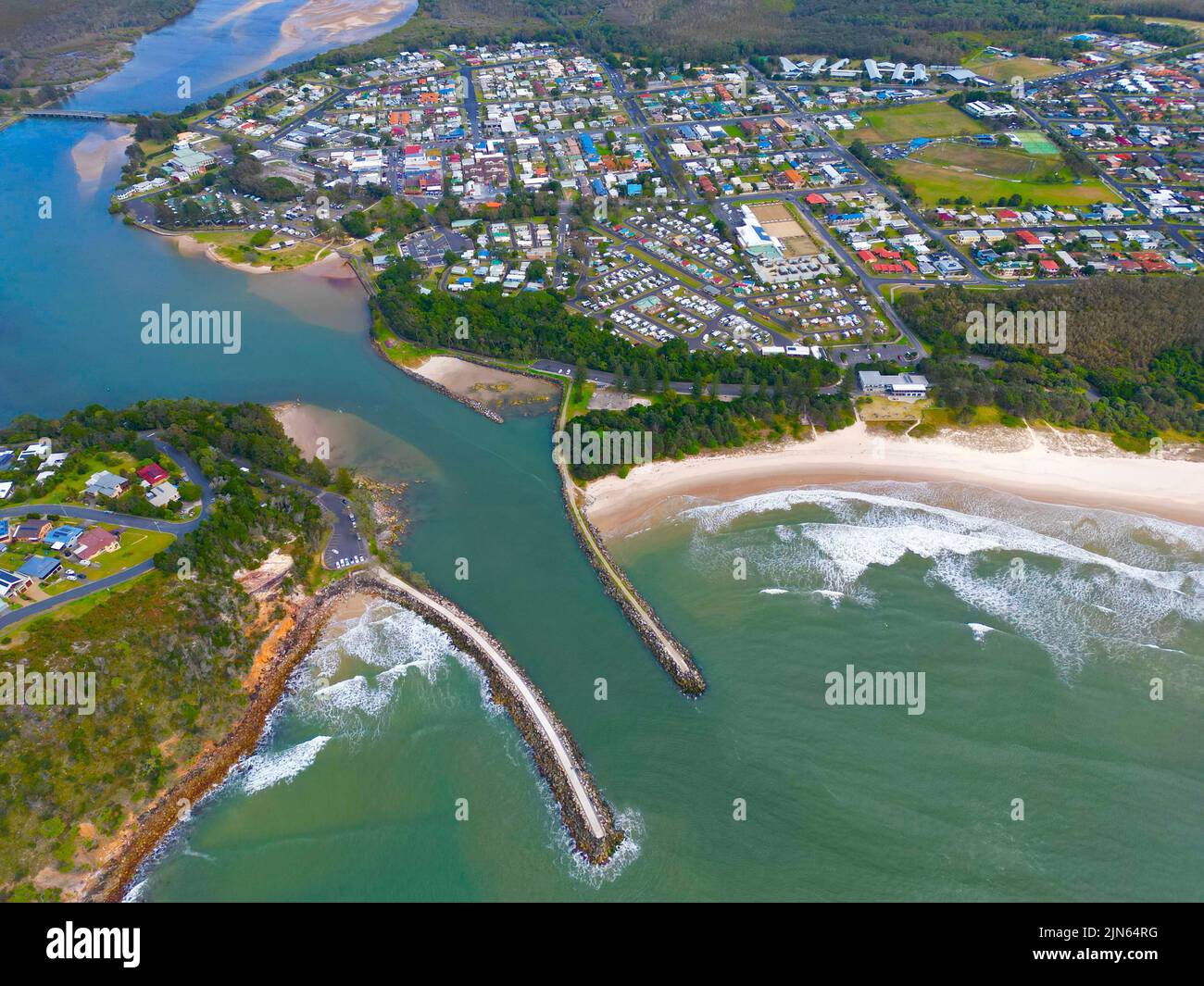 An aerial view of a small town on the bank of a river Stock Photo - Alamy