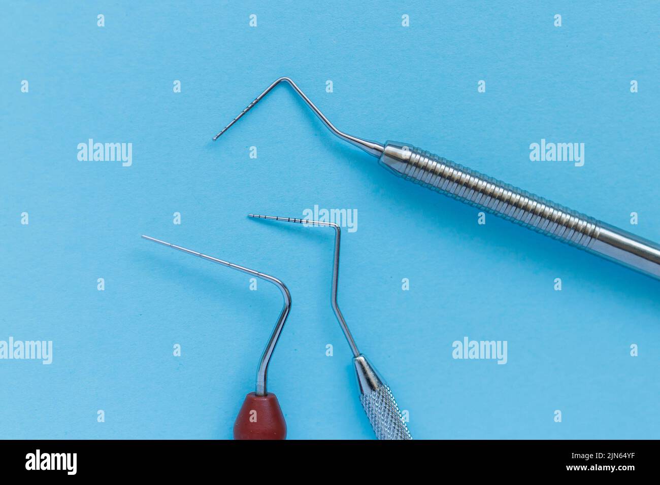 Dental probes on white background Stock Photo - Alamy