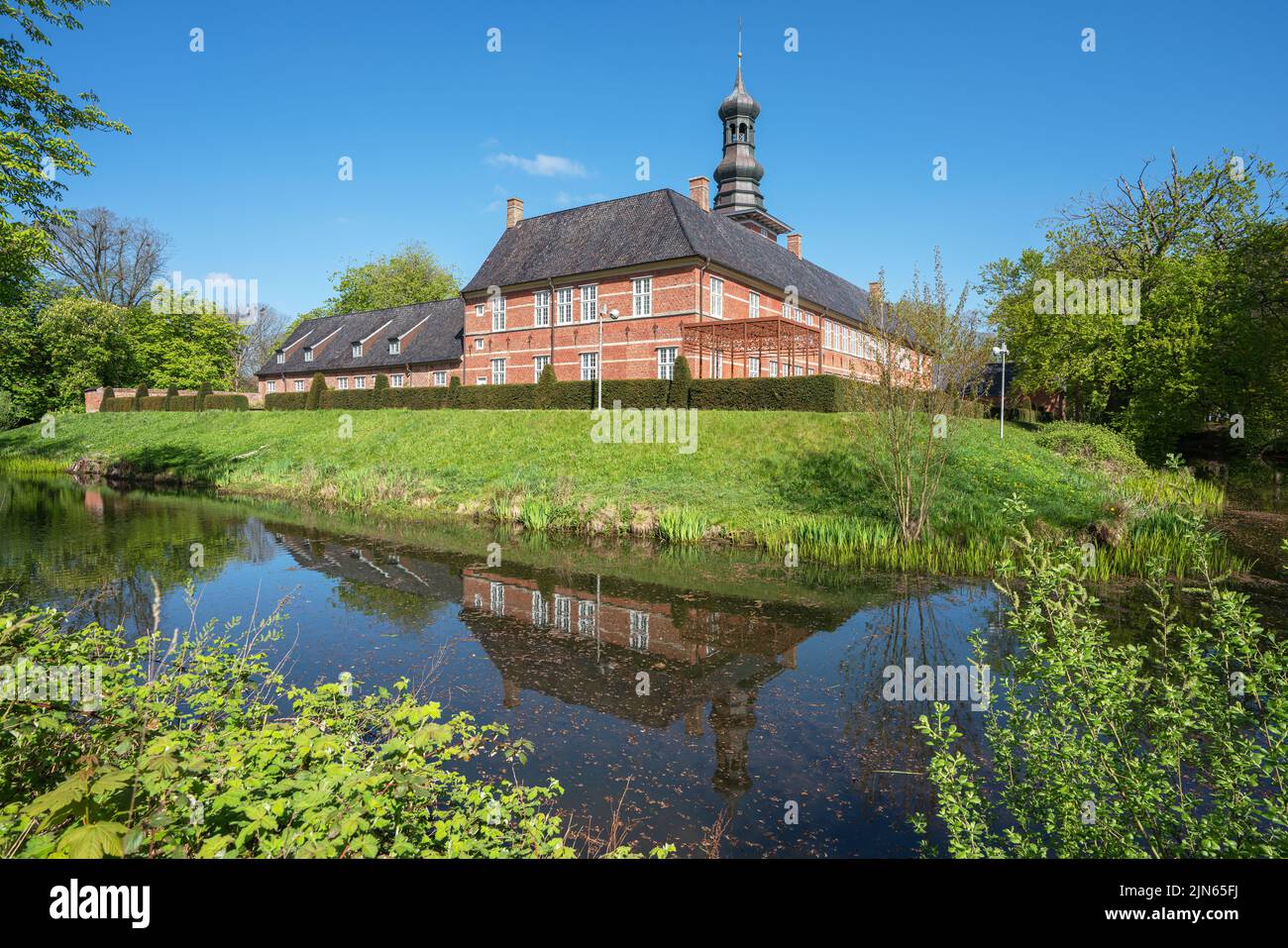 HUSUM, GERMANY - MAY 8, 2022: Husum Castle against blue sky, tourist ...