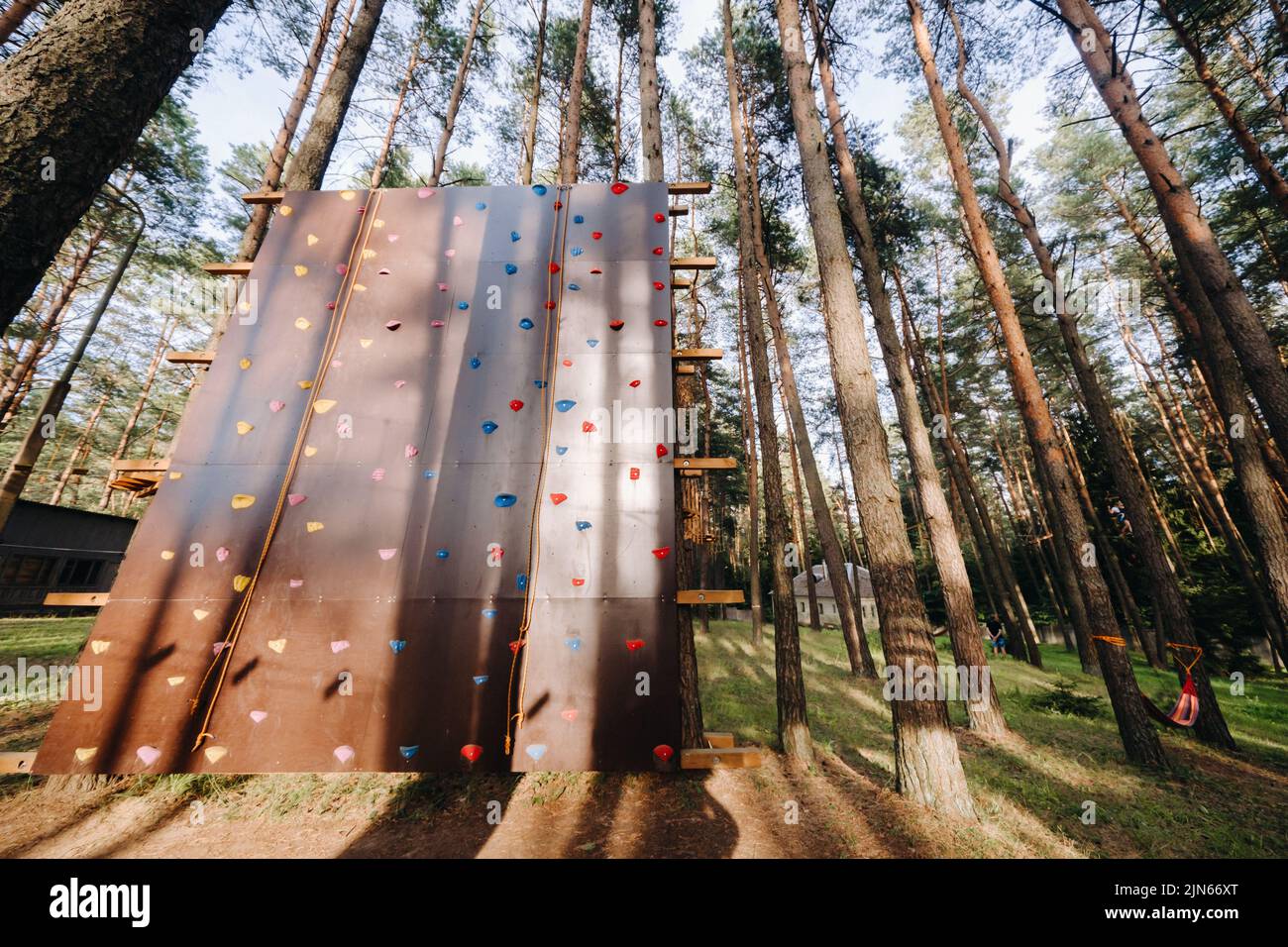 Rope park. Climbing wall in the forest Stock Photo - Alamy