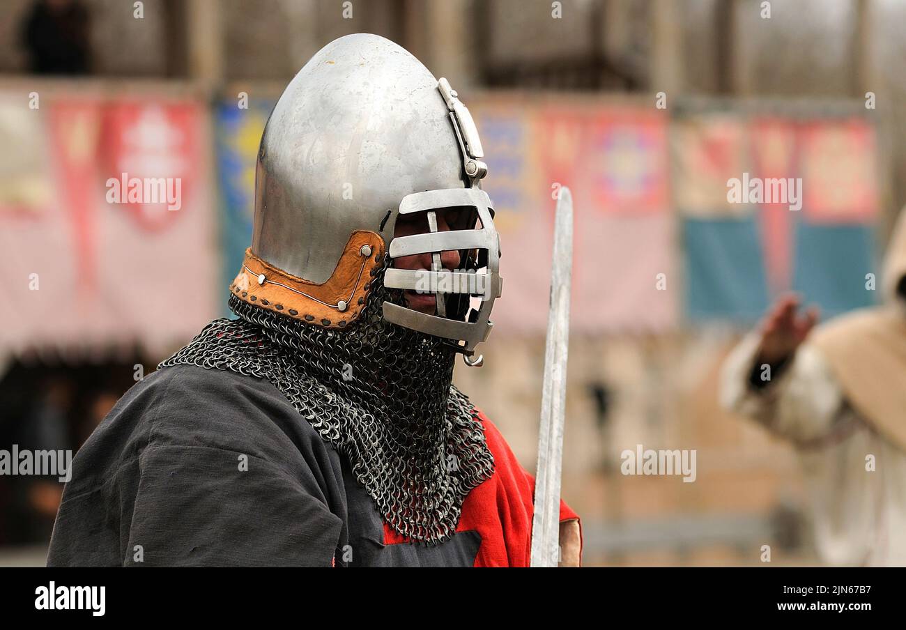 Reenactor man dressed in armor of an Old Rus footman reconstructing ...