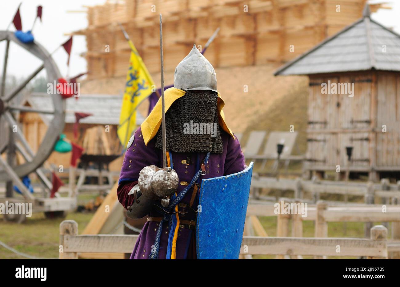 Reenactor man dressed in armor of an Old Rus footman reconstructing ...