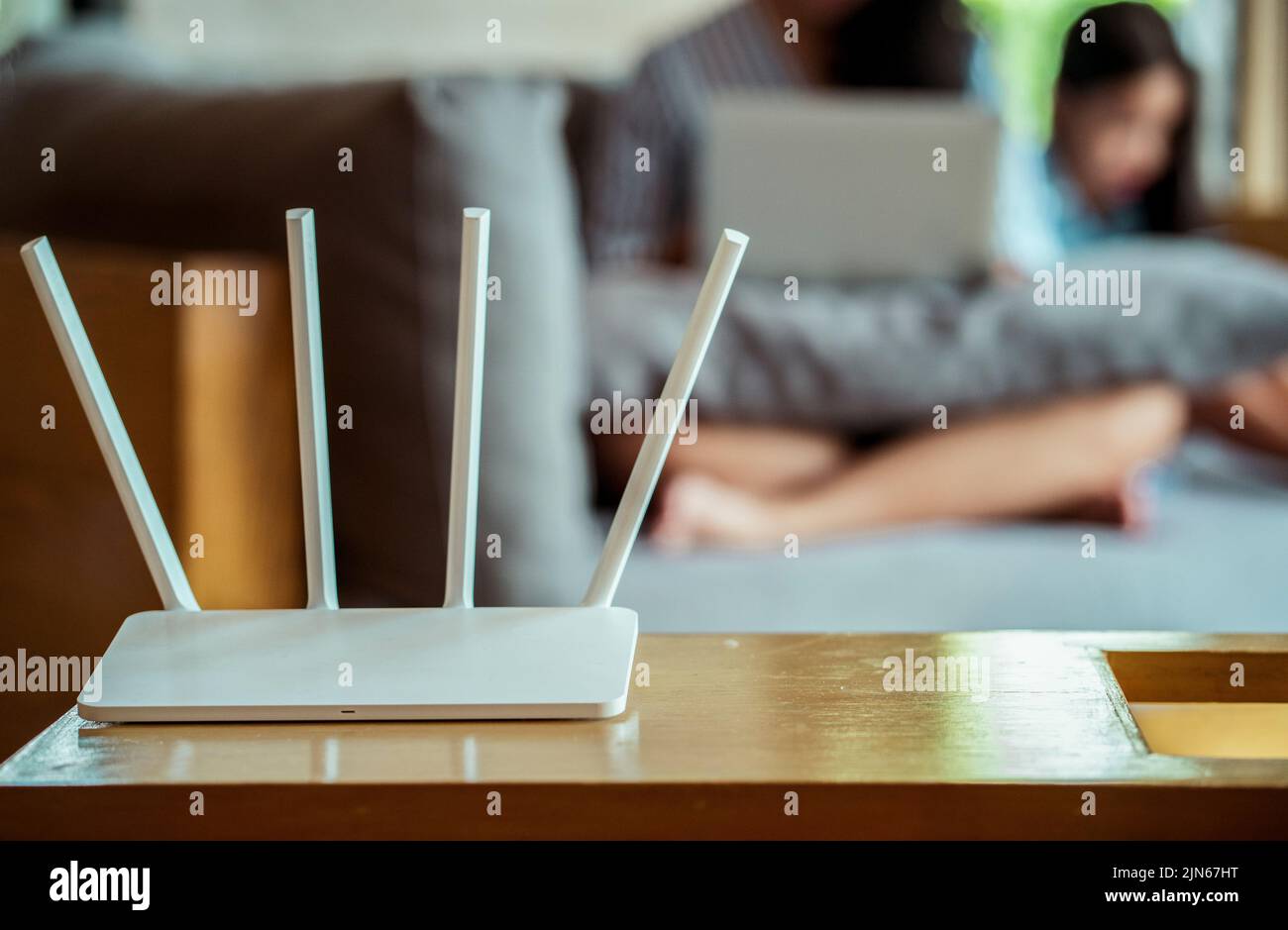 closeup of a wireless router on living room at home Stock Photo - Alamy