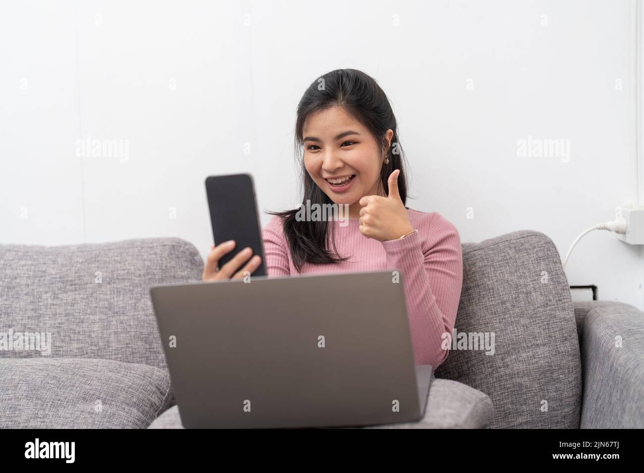 Happy teen girl using smartphone app enjoying online virtual chat video ...