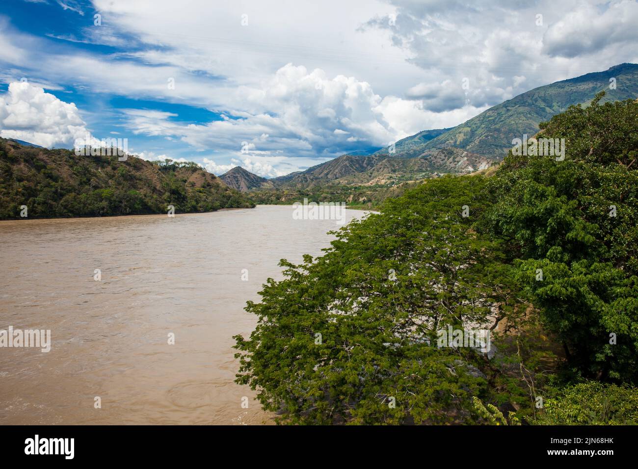 View of the Cauca River from the historical Bridge of the West a a ...