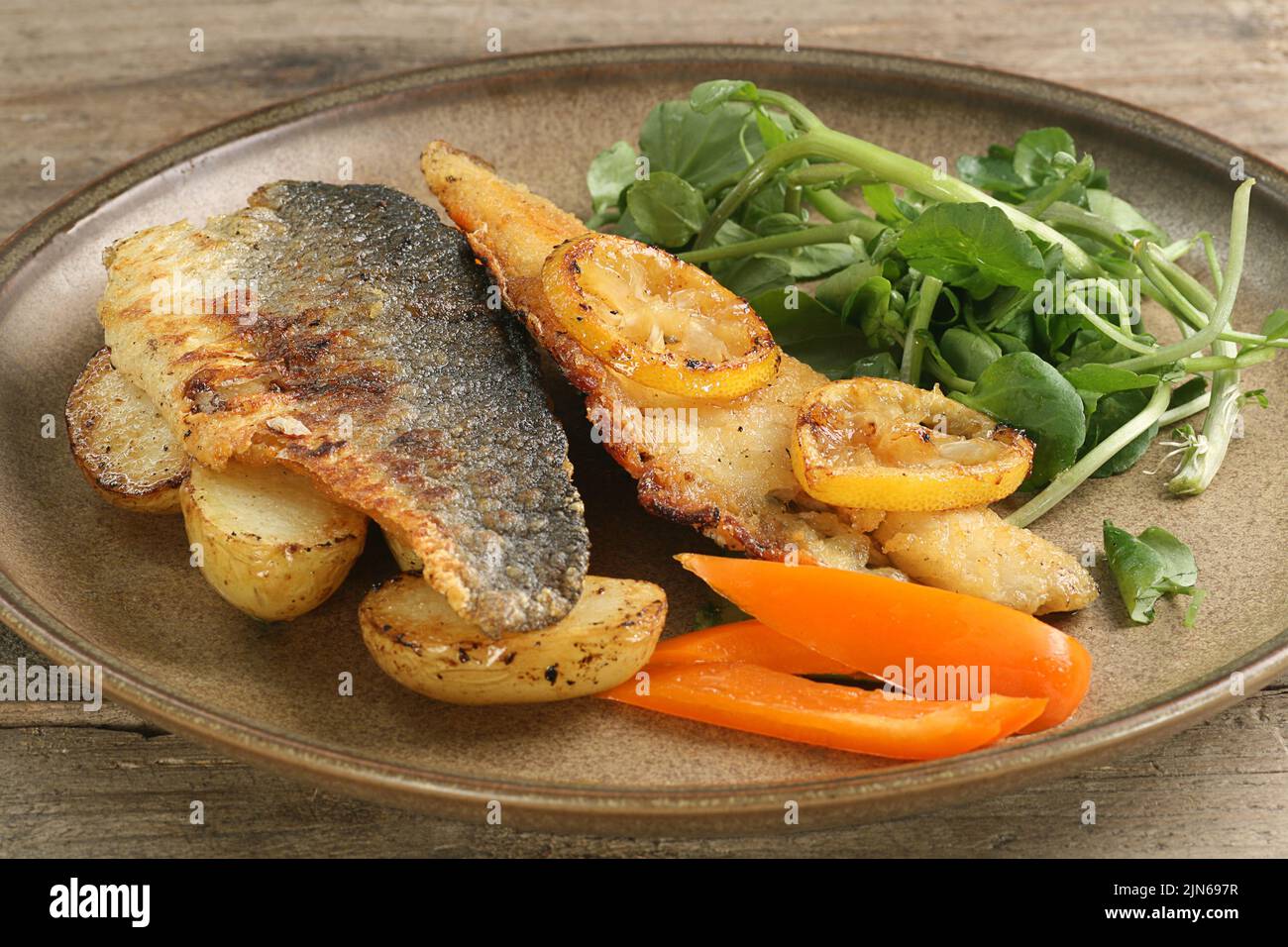 fried sea bass Stock Photo - Alamy