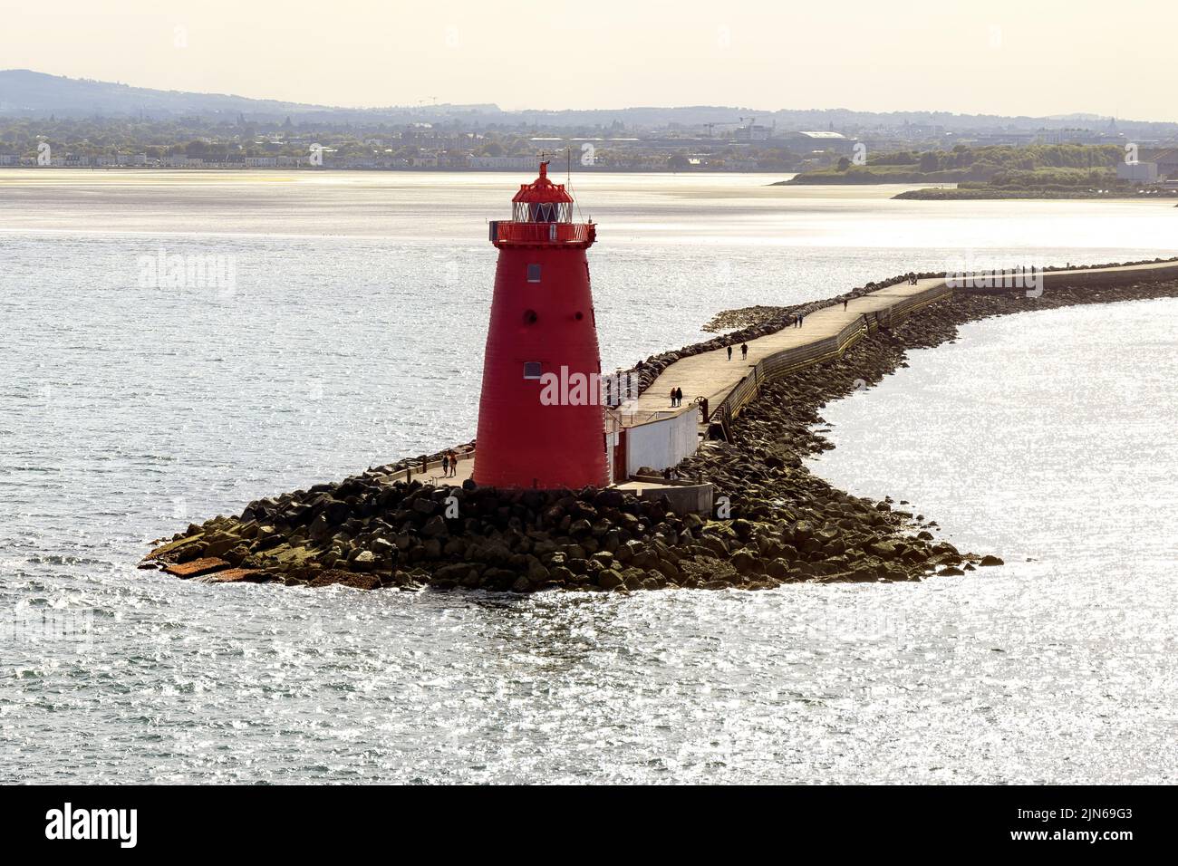 The Poolbeg Lighthouse stands at the end of the South Wall at the ...