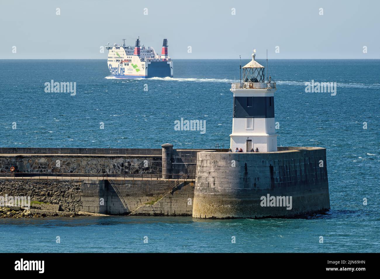 The ferry Stena Adventurer passing the Holyhead Breakwater lighthouse ...