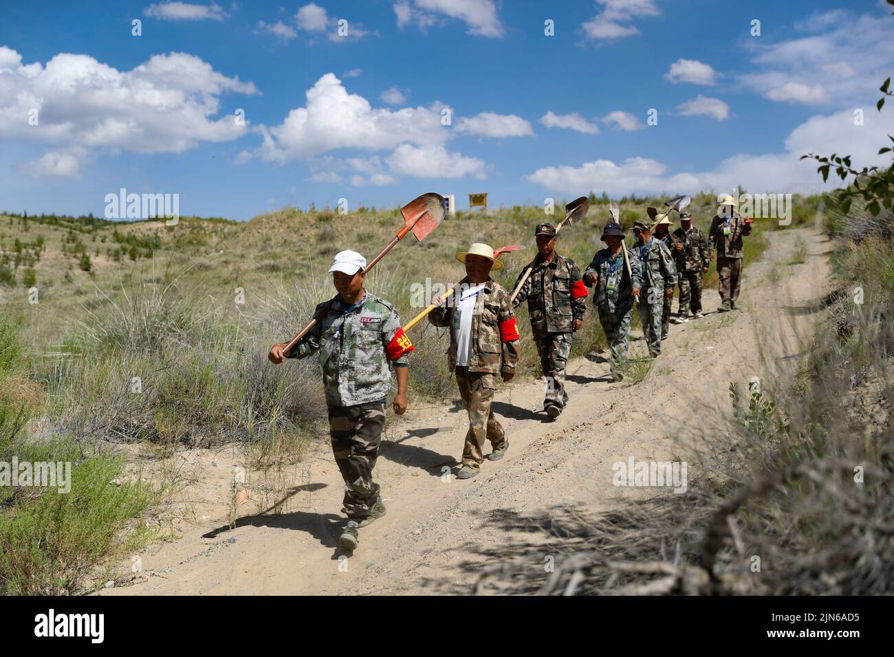 HAIXI, CHINA - AUGUST 9, 2022 - Members of the sand control team rush ...