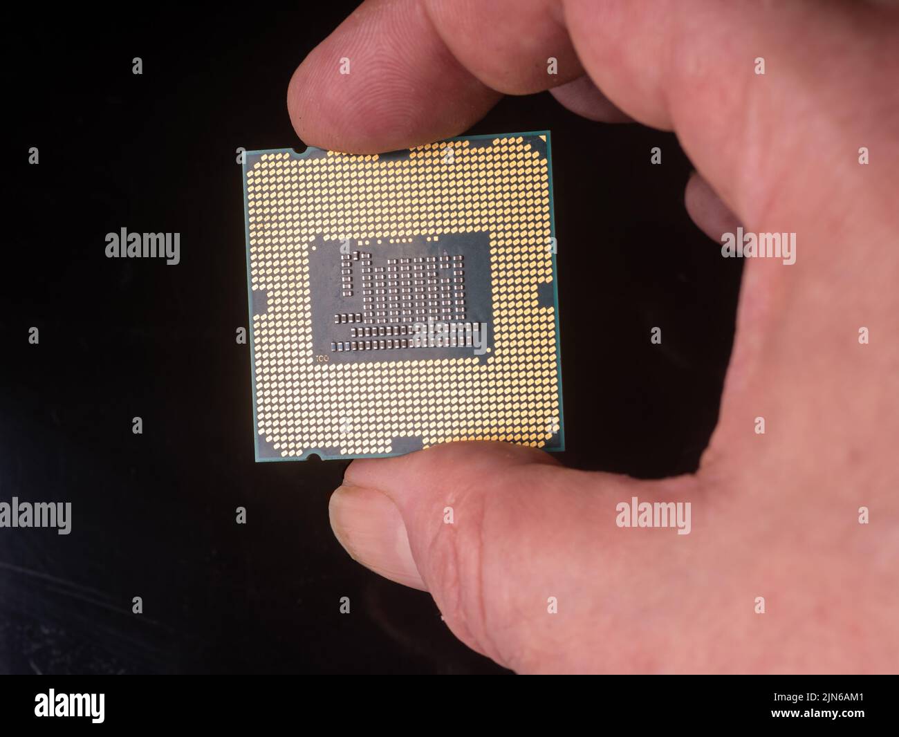 Human Hand Holding A Computer Chip / CPU Stock Photo - Alamy