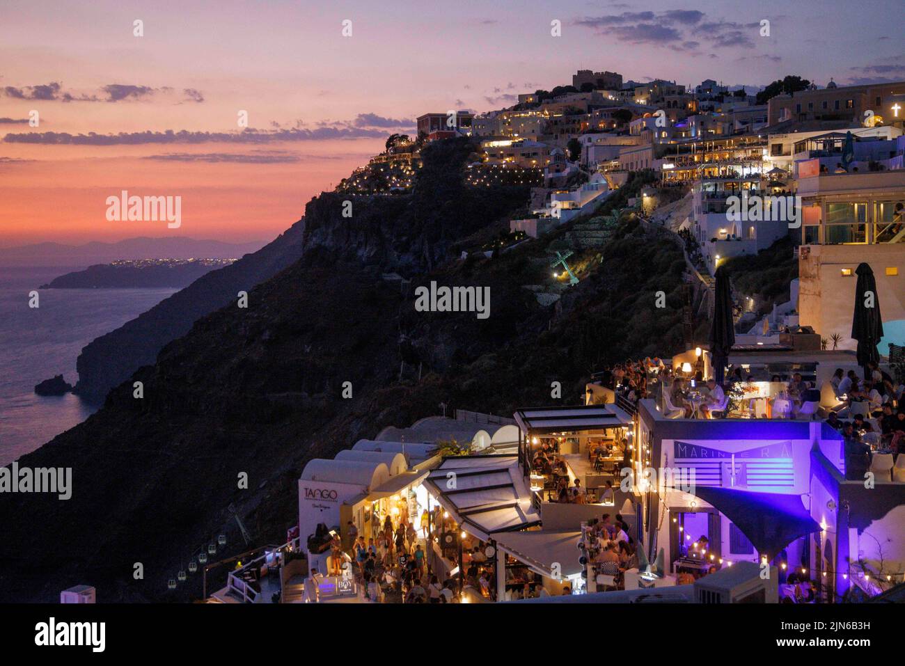 The town of Fira or Thira on the Cycladic island of Santorini in the ...