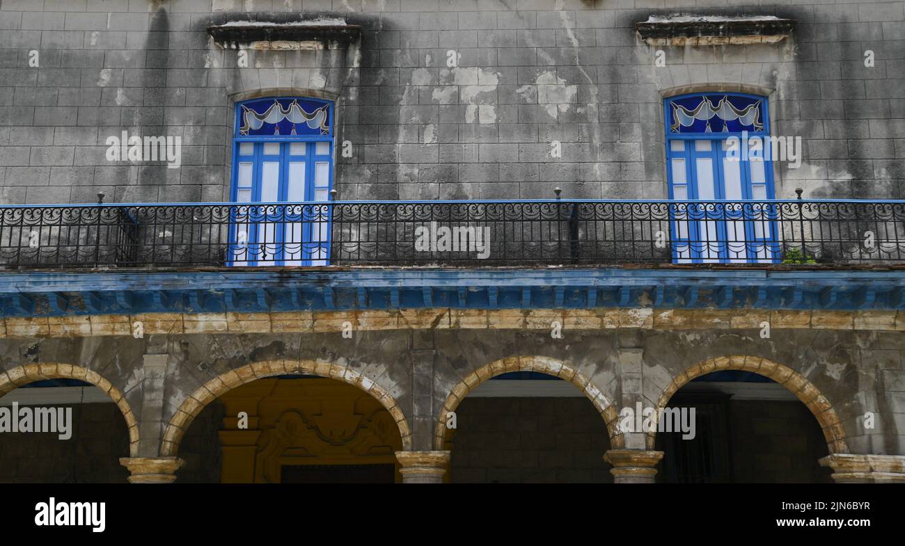 Cityscape with scenic facade view of Palacio del Conde Lombillo a ...