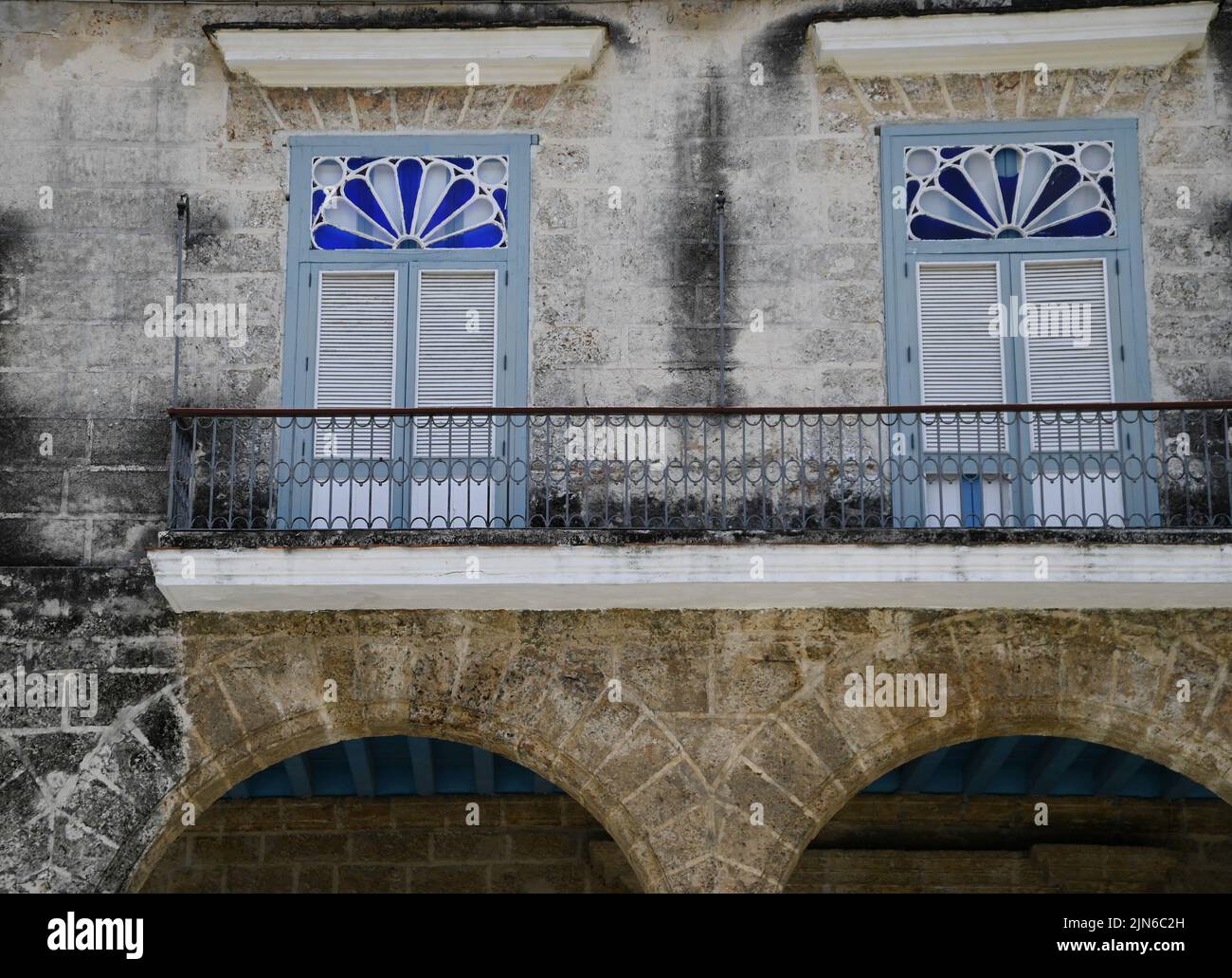 Cityscape with scenic facade view of Palacio del Conde Lombillo a ...