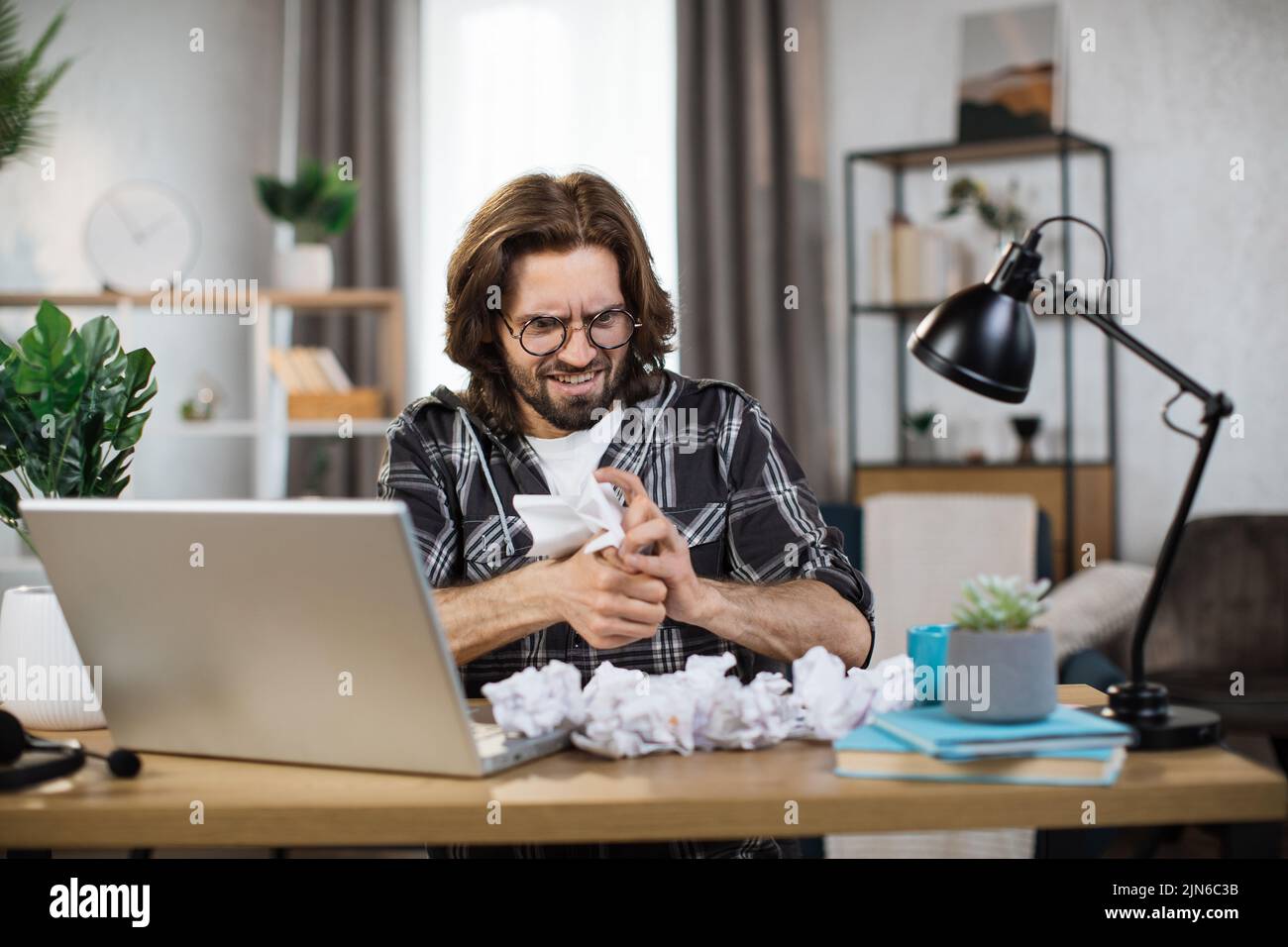 Irritated angry man, freelancer or manager, got a negative financial ...