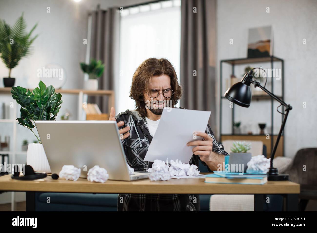 Man reading letter angry hi-res stock photography and images - Alamy