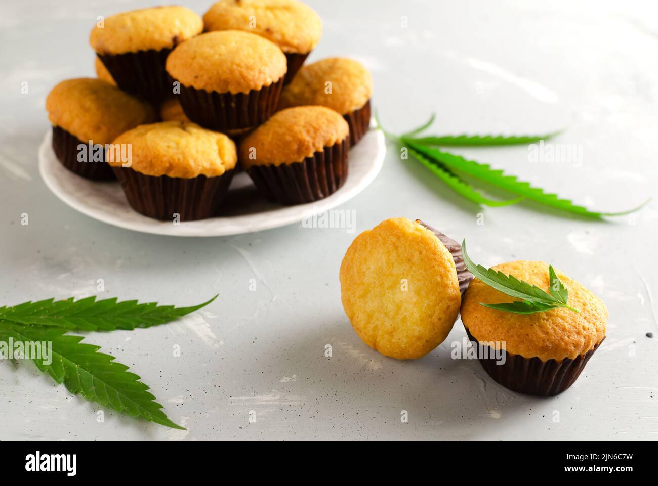 Many Marijuana cupcake muffins with cannabis leaves. Gluten free ...