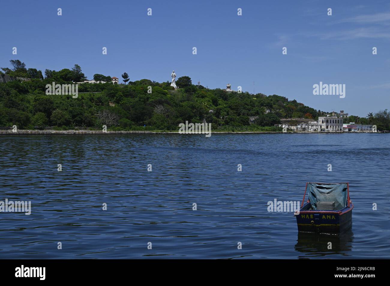 Landscape with scenic view of a fishing boat on the waters of Canal de ...