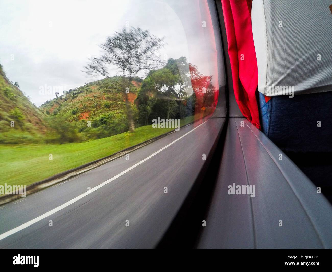 watching the road through the bus window Stock Photo - Alamy