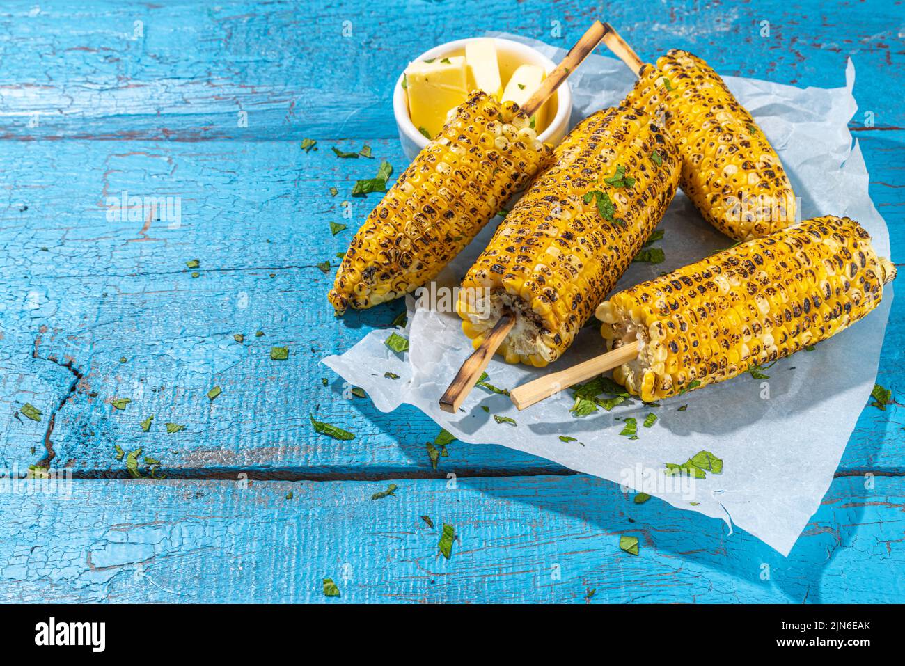 Sweet corn grilled with butter, cheese, cilantro and herbs. Vegetarian ...
