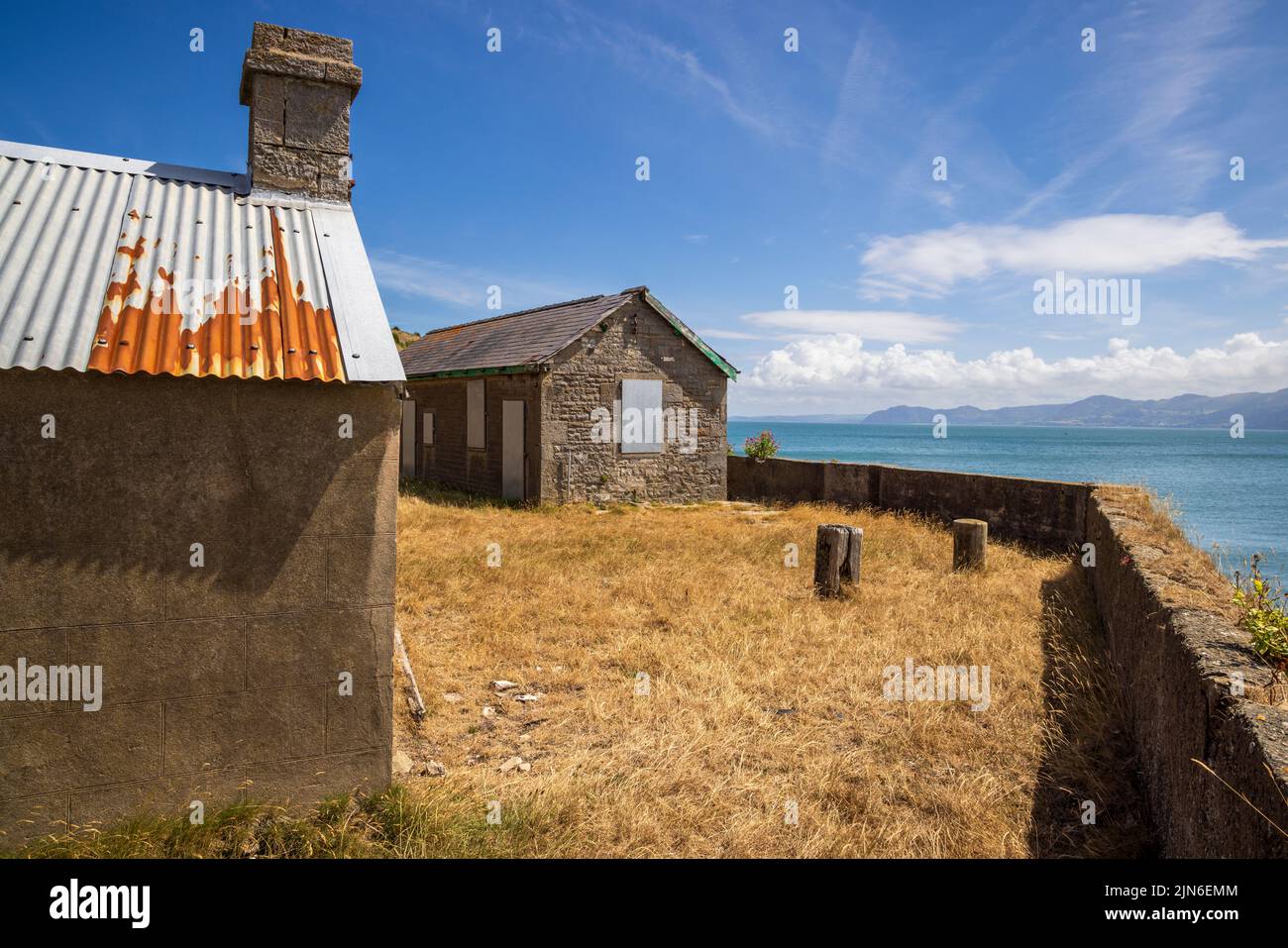 The disused Penmon Quarry buildings on the Menai Strait, Isle of ...