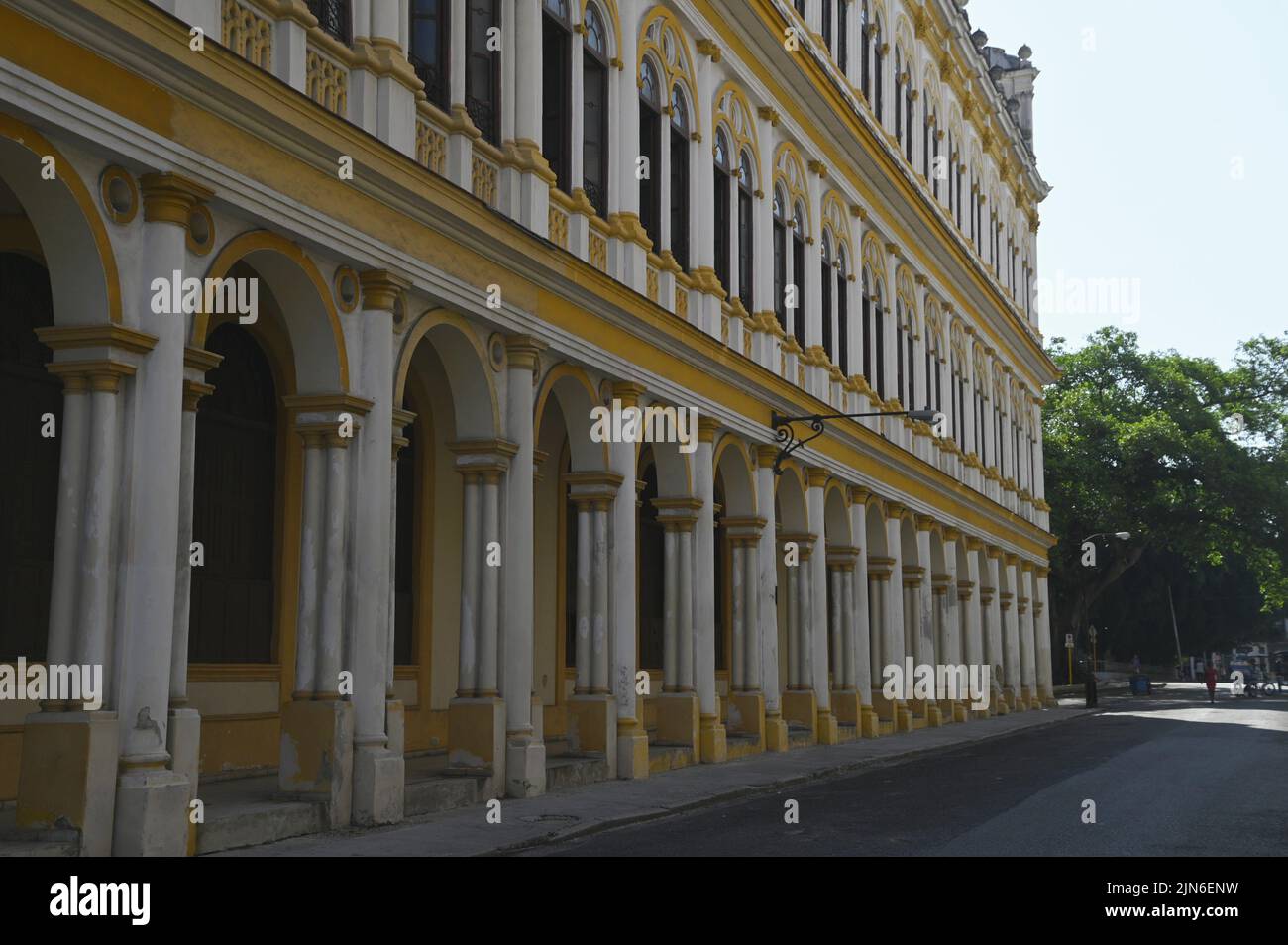 Old Colonial building with arched columns in downtown Havana, Cuba ...