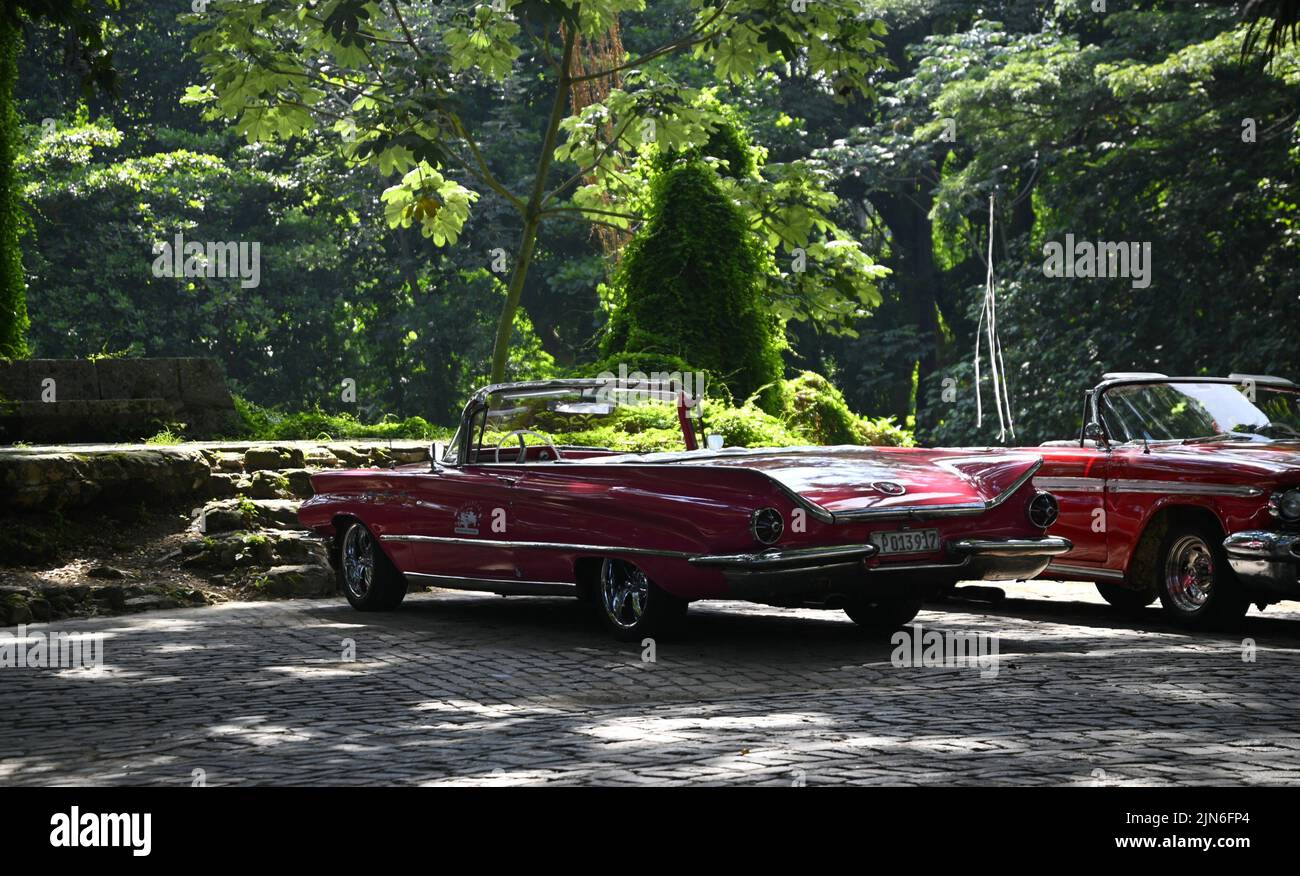 Vintage fuchsia pink 1956 Buick Le Sabre with polished chrome plated ...