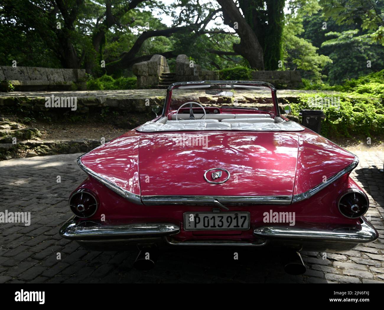 Vintage fuchsia pink 1956 Buick Le Sabre with polished chrome plated ...