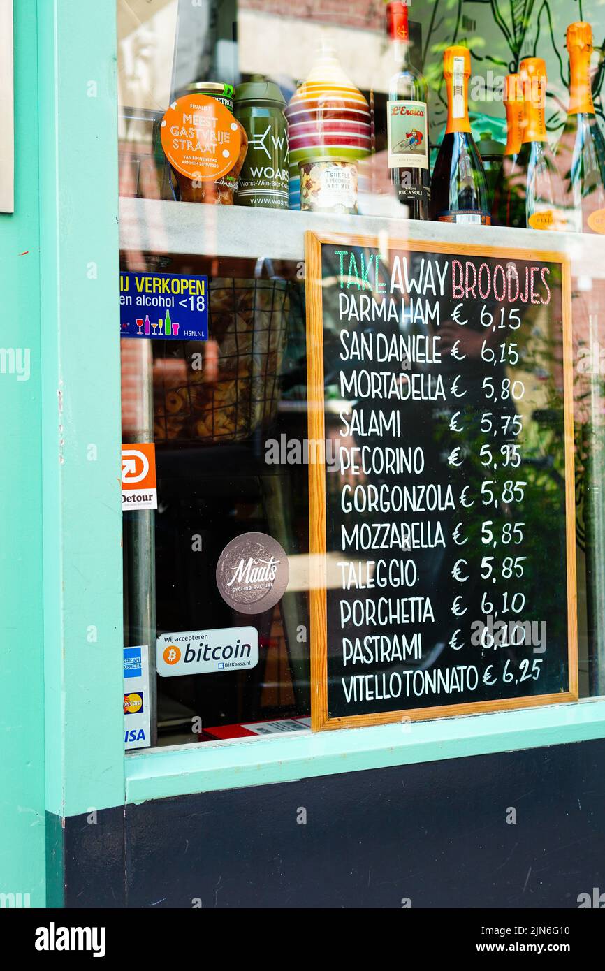 A shop with the bitcoin payment acceptance in Arnhem Stock Photo - Alamy