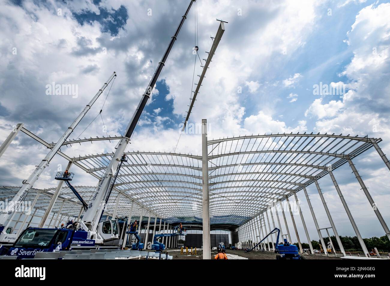 Building construction showing steel beams and working at height Stock ...