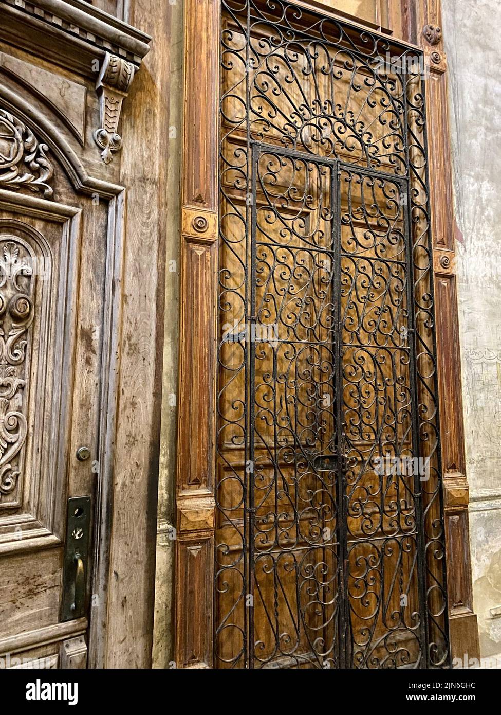 Closeup view of the hand carved wooden entrance door of La Mansión ...