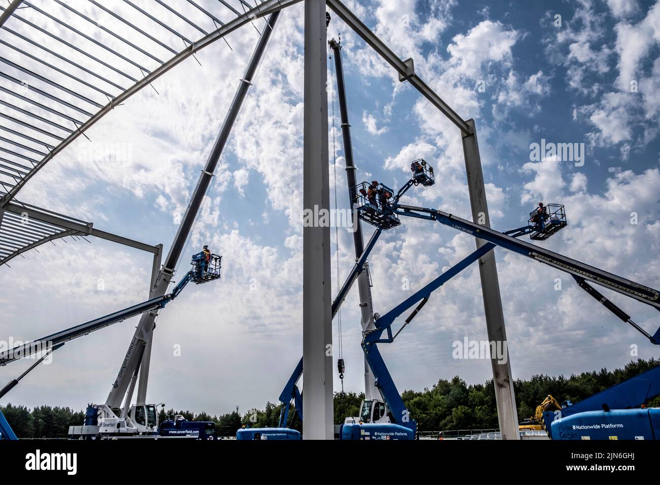 Building construction showing steel beams and working at height Stock ...