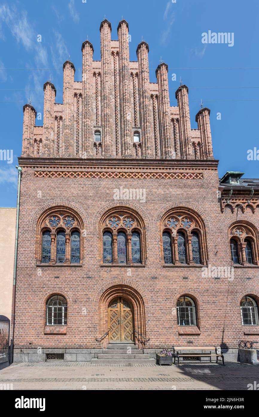 brick facade of Neo-Medieval Town Hall, shot in bright sun light at ...