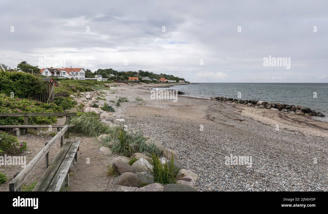 landscape with stony beach on shore of Kattegat sea, shot in stormy ...