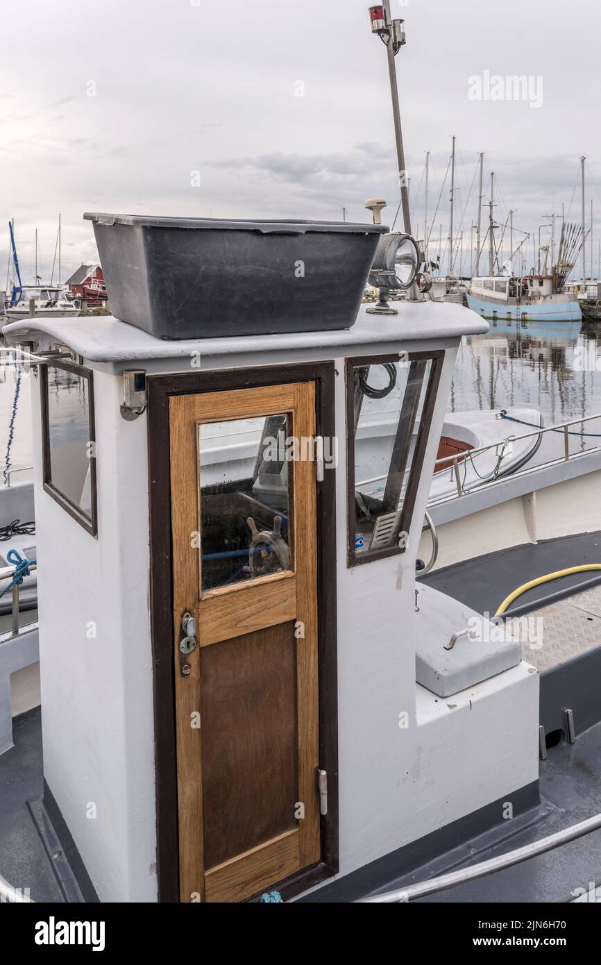 detail of cockpit of little traditional fishing boat at harbor, shot in ...