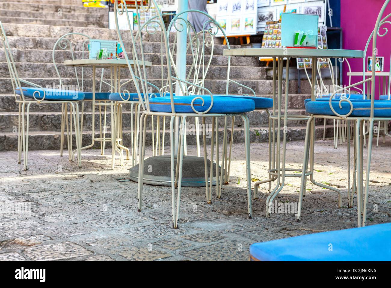 Chairs of sidewalk cafe . Street cafeteria place Stock Photo - Alamy