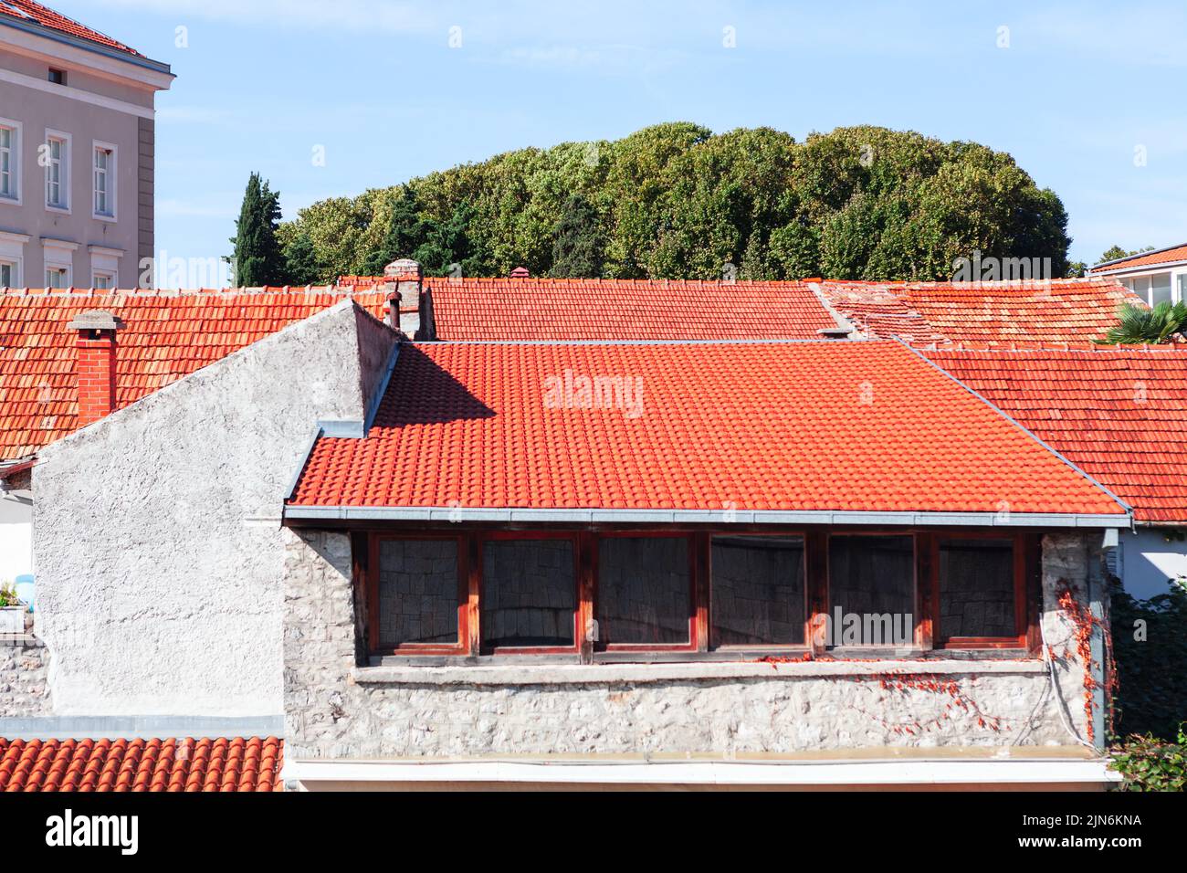Architecture with tiled roof . Building with traditional rooftop Stock ...