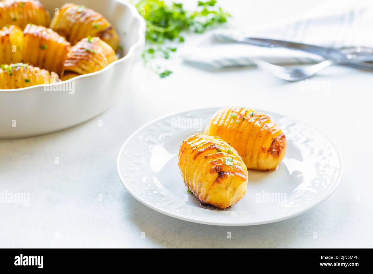 Hasselback potatoes with additional herbs and spices. In Turkey, fan ...