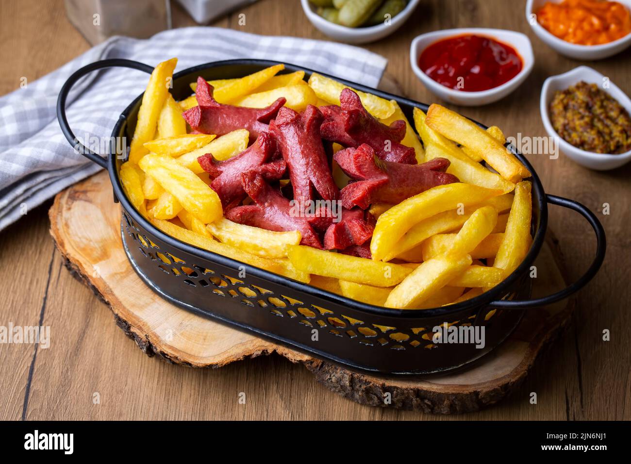 French fries and sausage fries platter (Turkish name; patates ve sosis ...