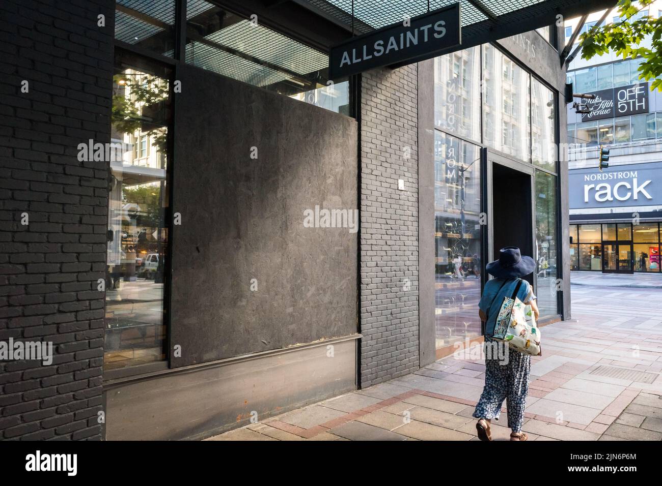 Seattle, USA. 8th Aug, 2022. Boarded up window at All Saints on 5th and ...