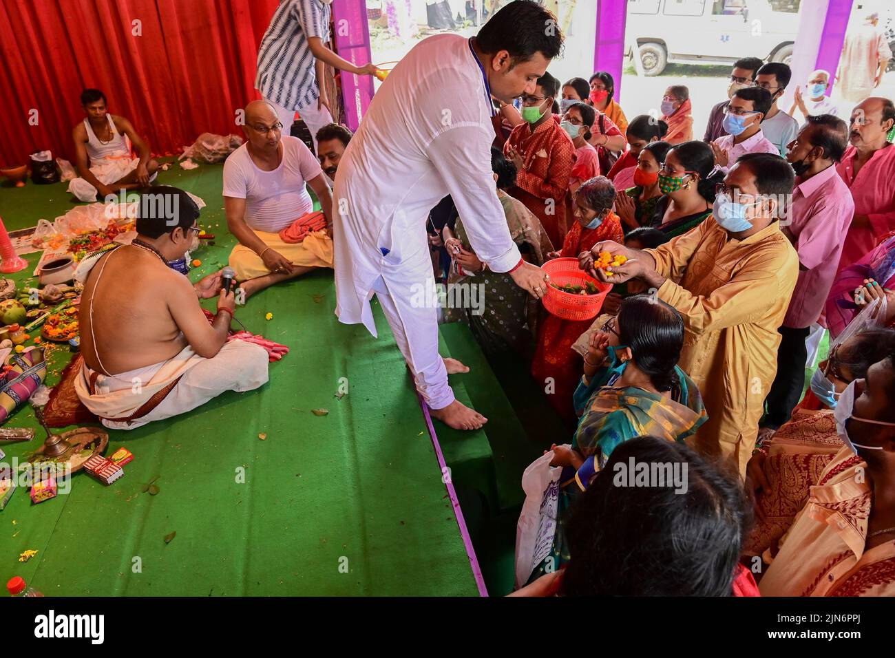 Howrah, West Bengal, India - 14th October 2021 : Hindu devotees putting ...