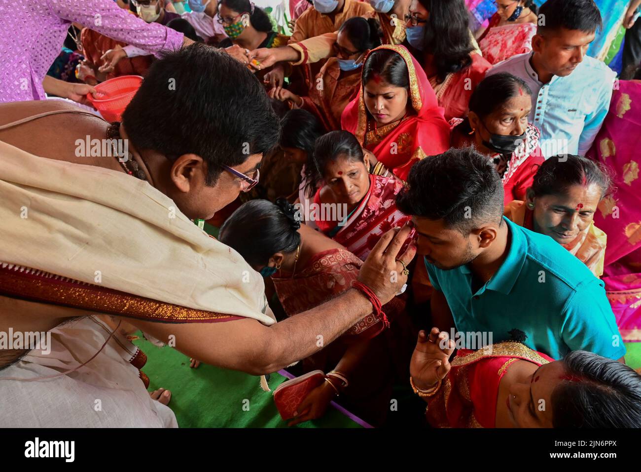 Howrah, West Bengal, India - 14th October 2021 : Hindu Purohit putting ...
