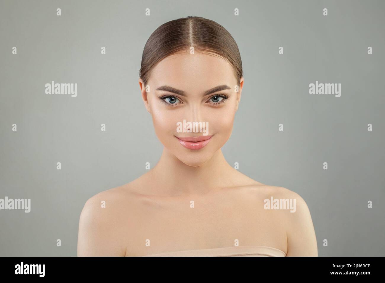 Pretty woman with perfect clean shiny skin. Facial treatment, skincare ...