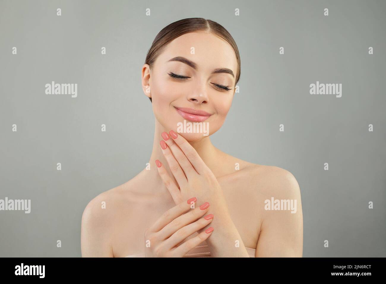 Beautiful model woman showing perfect hands with manicure and smiling ...