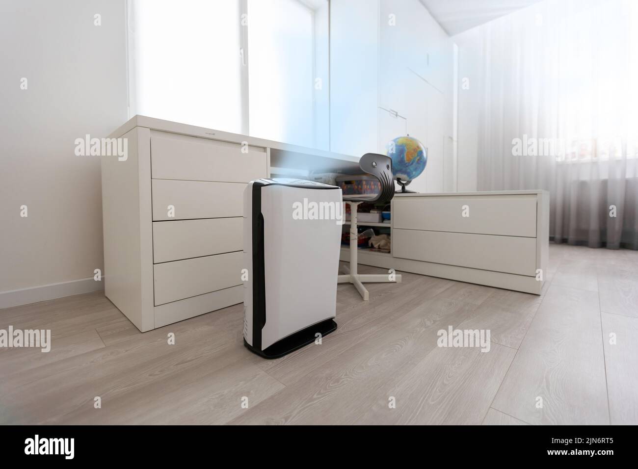 A modern humidifier in the children's bedroom. Maintaining the climate ...