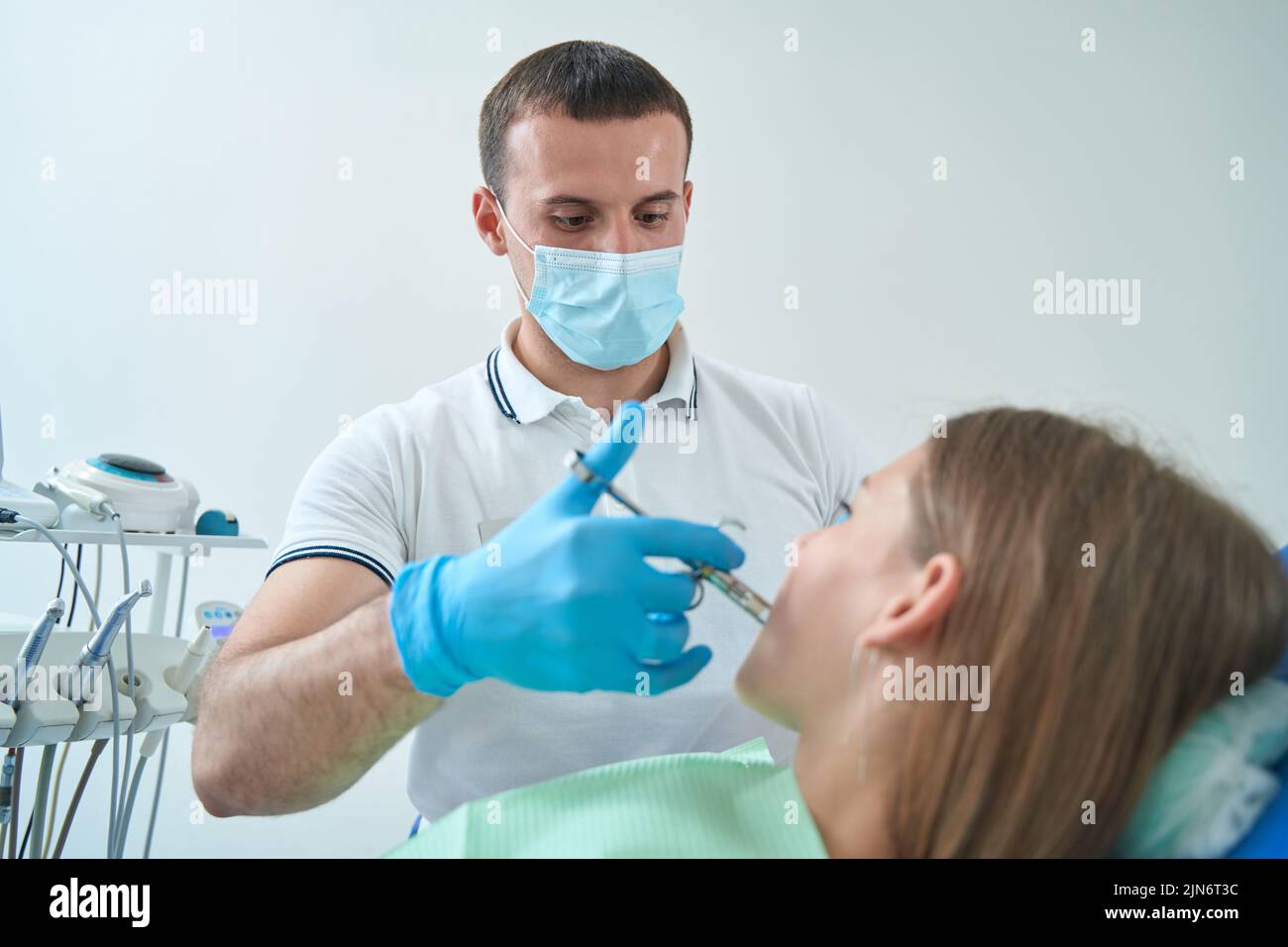 Pedodontist using local anesthesia before teeth treatment Stock Photo ... Pedodontist using local anesthesia before teeth treatment Stock Photo ...
