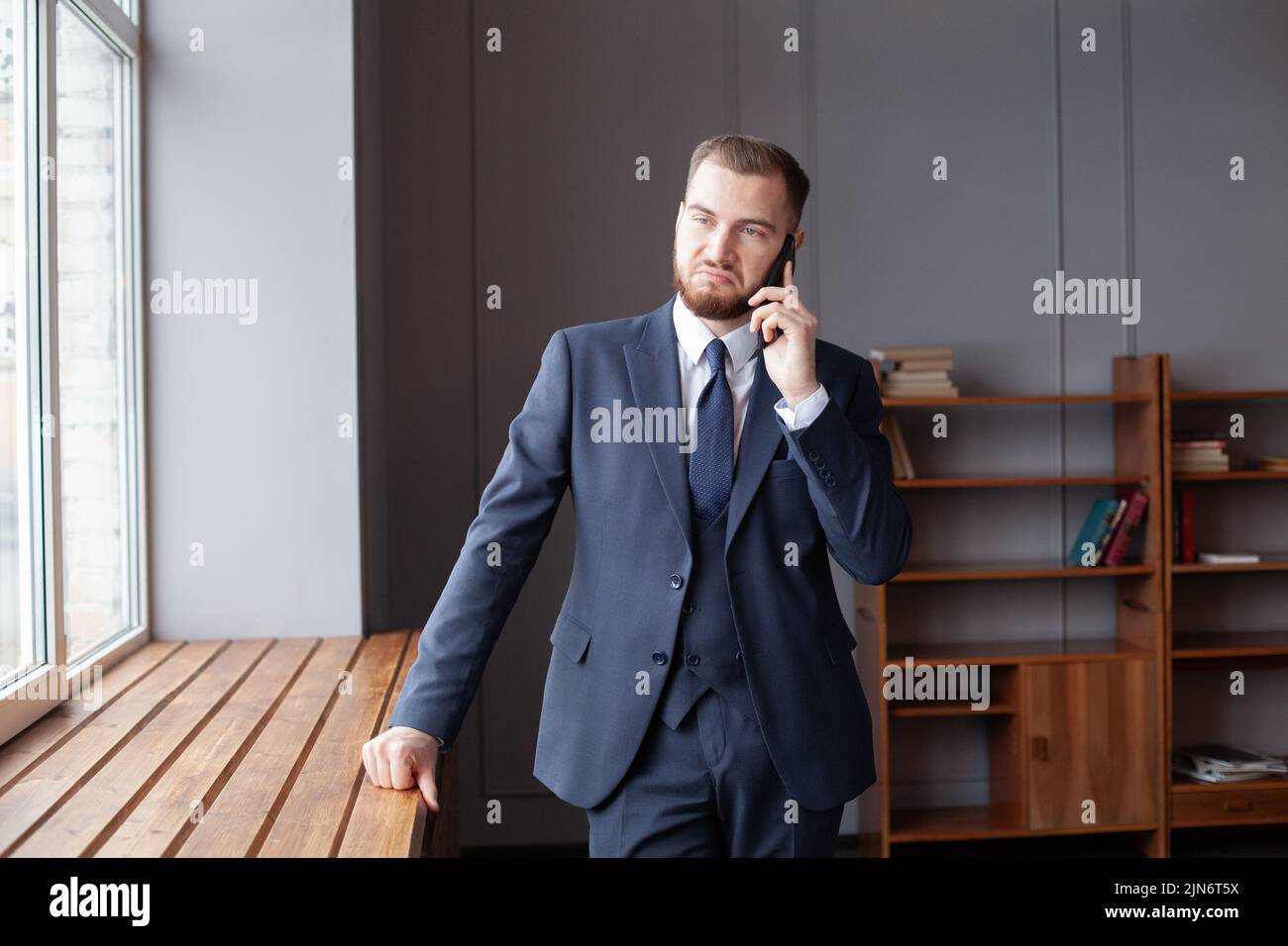 Sad men talking hi-res stock photography and images - Alamy